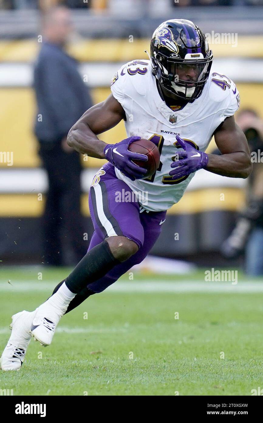 Baltimore Ravens running back Justice Hill carries during the first ...