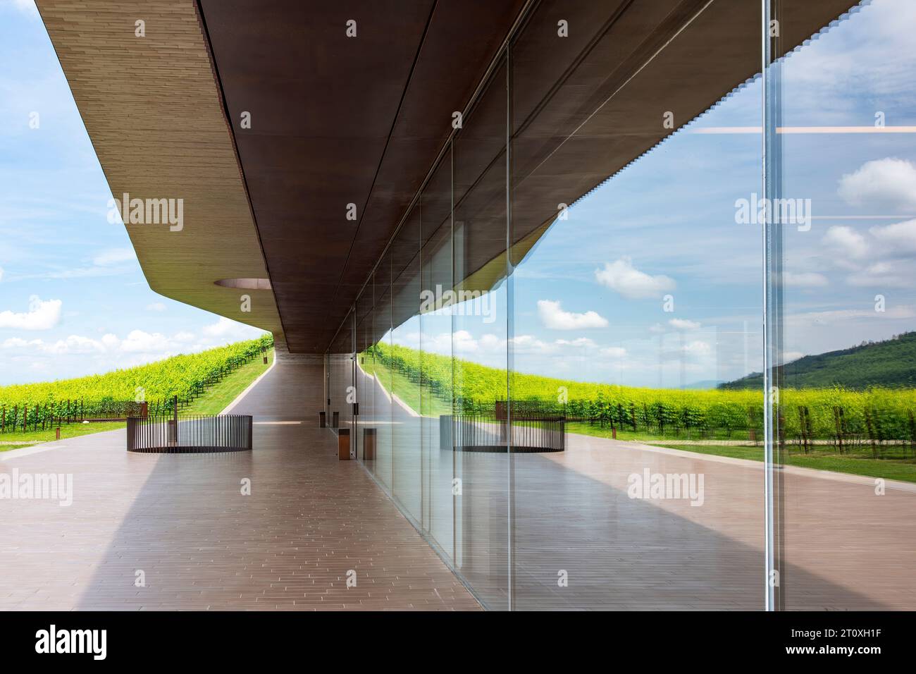 Bargino, Italy-June 9, 2023; Overview of the front facade of glass with ...