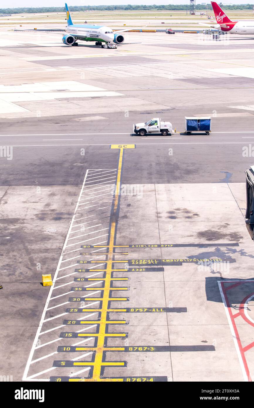 JFK Airport, NY, USA- July 11, 2023; High angle view of yellow airport ...