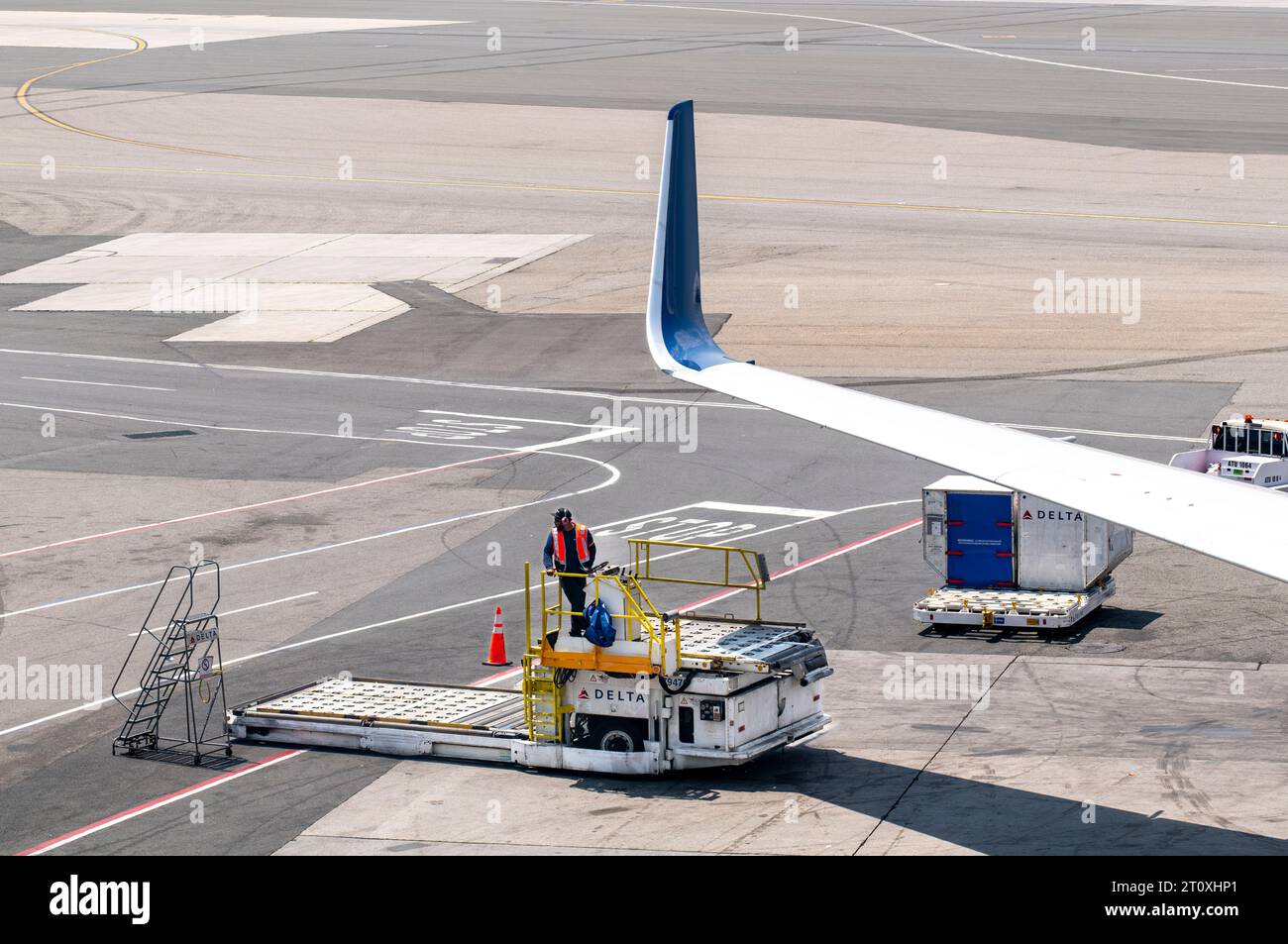 JFK Airport, NY, USA- July 11, 2023; High angle view of a unit load ...