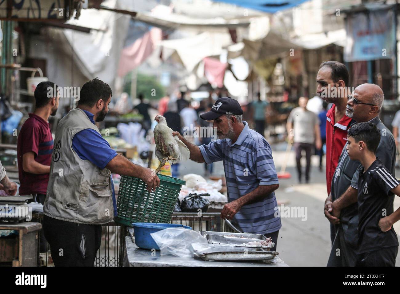 Gaza City, Palestinian Territories. 09th Oct, 2023. People buy food ...