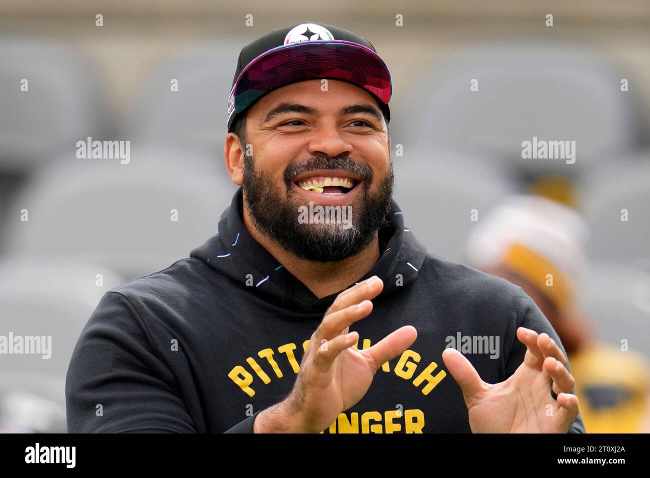 Pittsburgh Steelers defensive tackle Cameron Heyward tosses a football ...