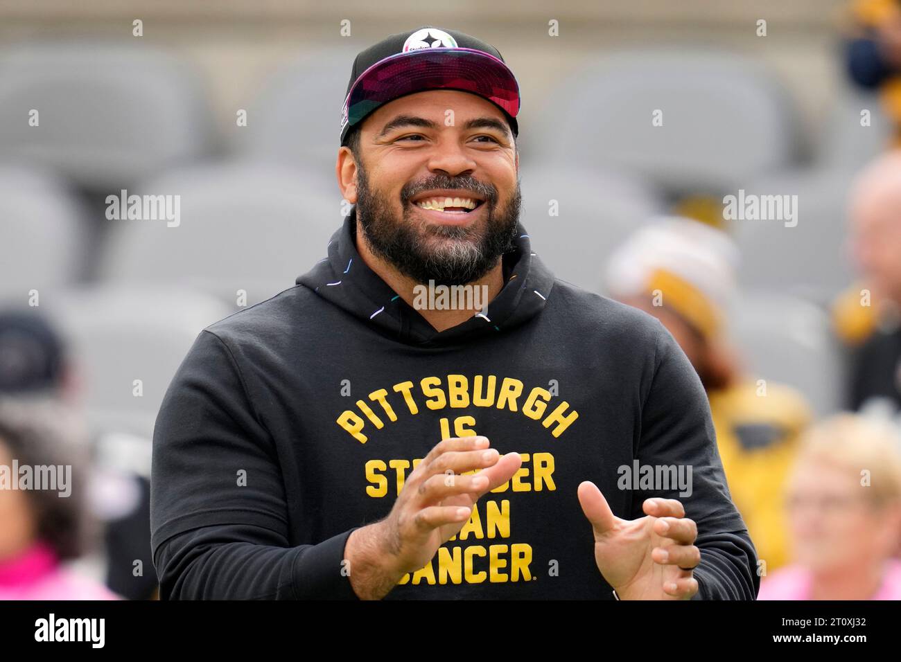 Pittsburgh Steelers defensive tackle Cameron Heyward tosses a football ...