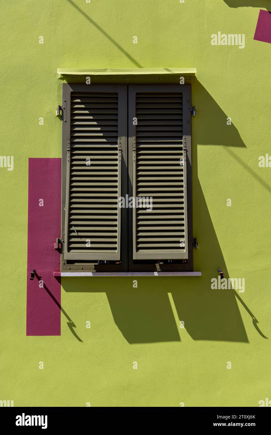 Ghizzano, Italy-June 8, 2023; Detail of window in series of wall ...