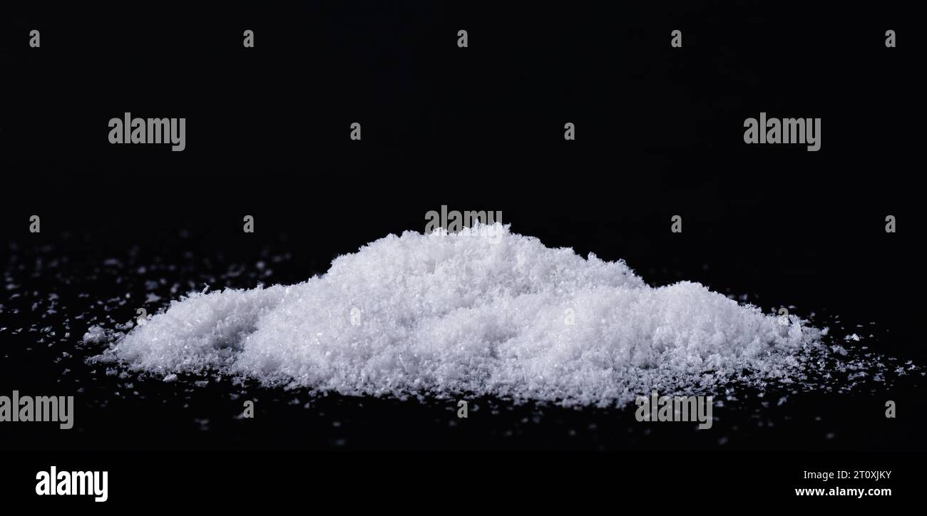 Pile of snow isolated on a black background. Heap of snow overlay for ...
