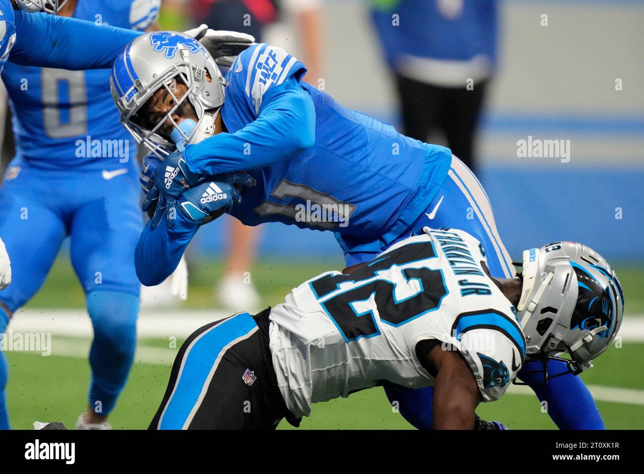 Detroit Lions wide receiver Kalif Raymond leaps over Carolina Panthers ...
