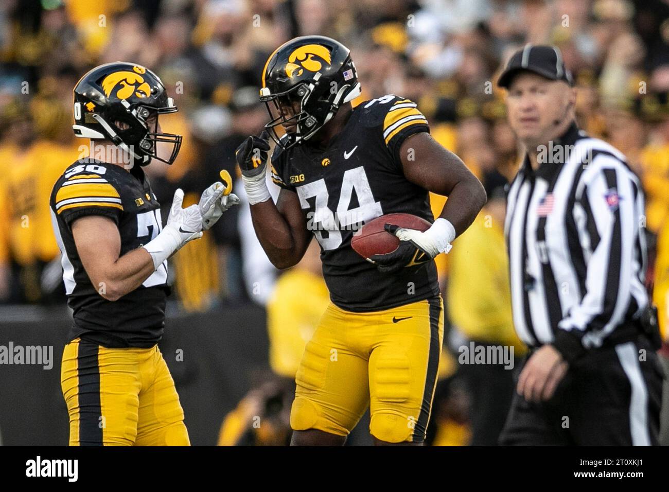 Iowa Hawkeyes linebacker Jay Higgins (34) celebrates his interception ...