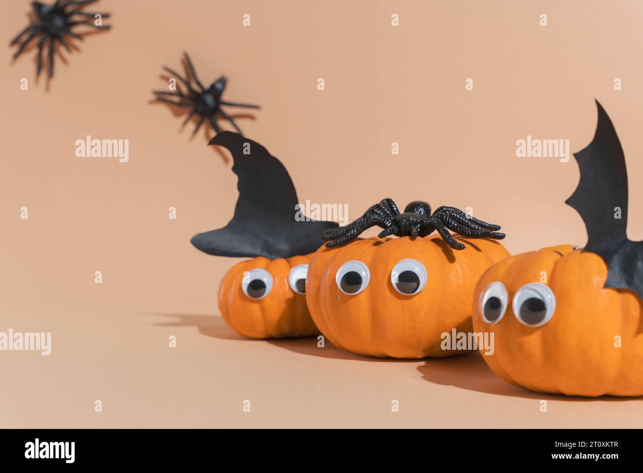 Halloween banner, cute pumpkins with googly eyes. Witch hat. Set orange ...