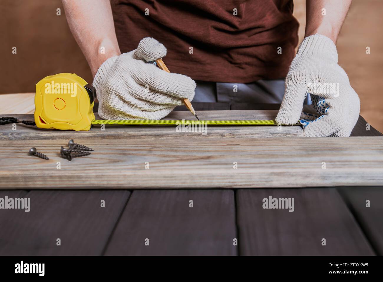 Banner of Carpenter Measuring a Wooden Plank by ruler in wooden ...