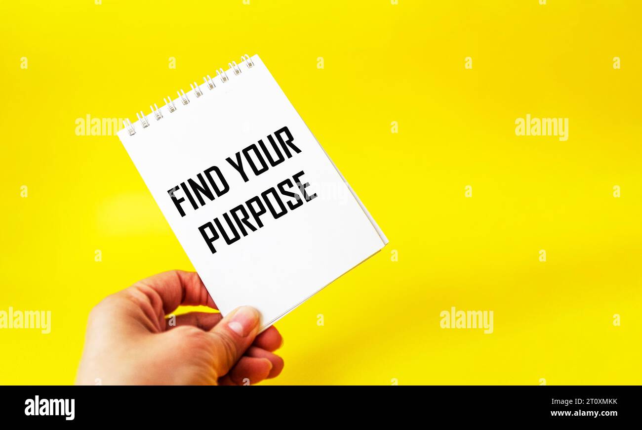 Find your goal text on the card, yellow background Stock Photo - Alamy