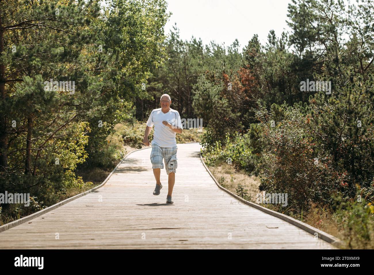 Person runs along path hi-res stock photography and images - Alamy