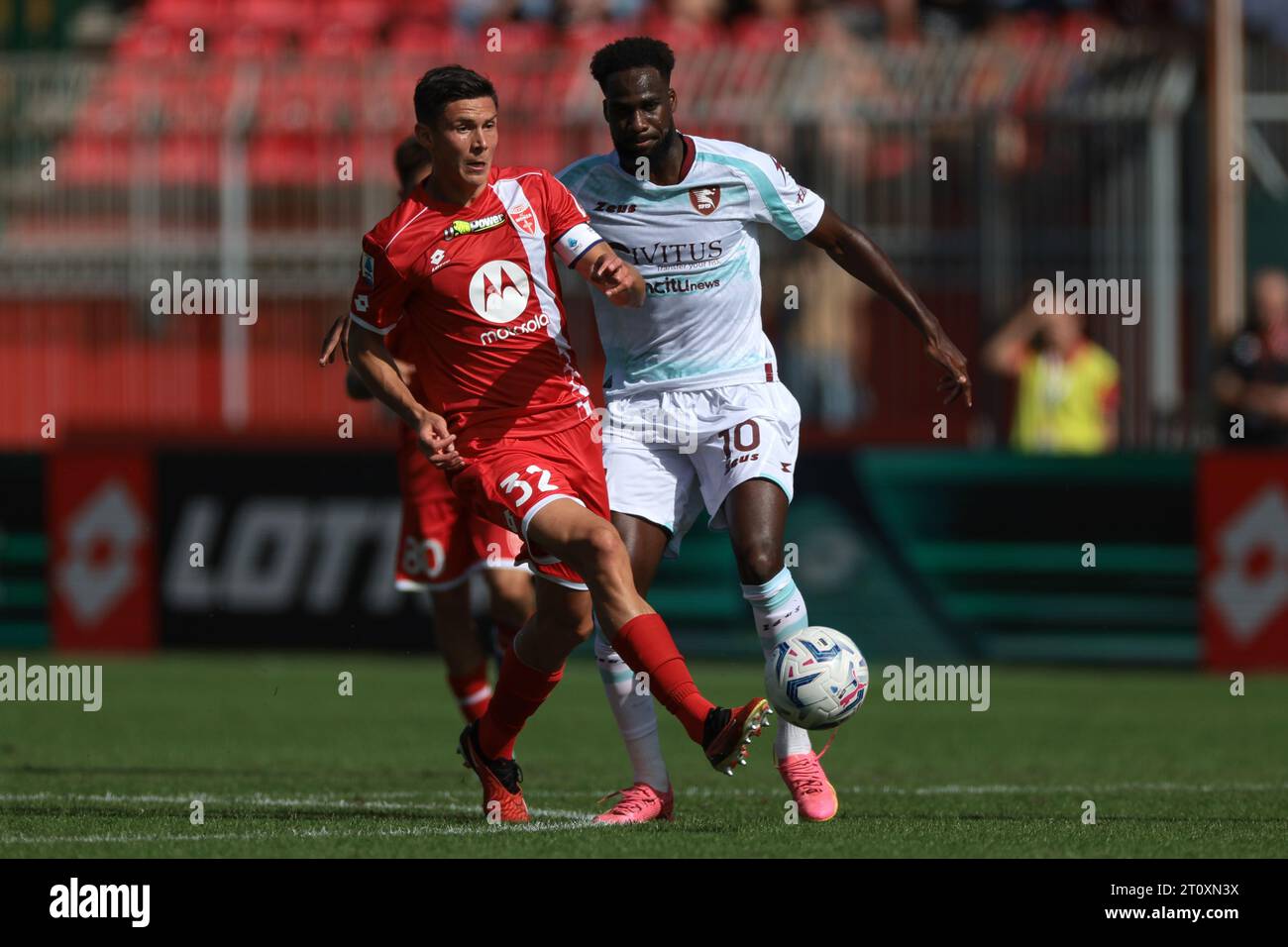 Monza, Italy. 8th Oct, 2023. Matteo Pessina of AC Monza dispossesses ...
