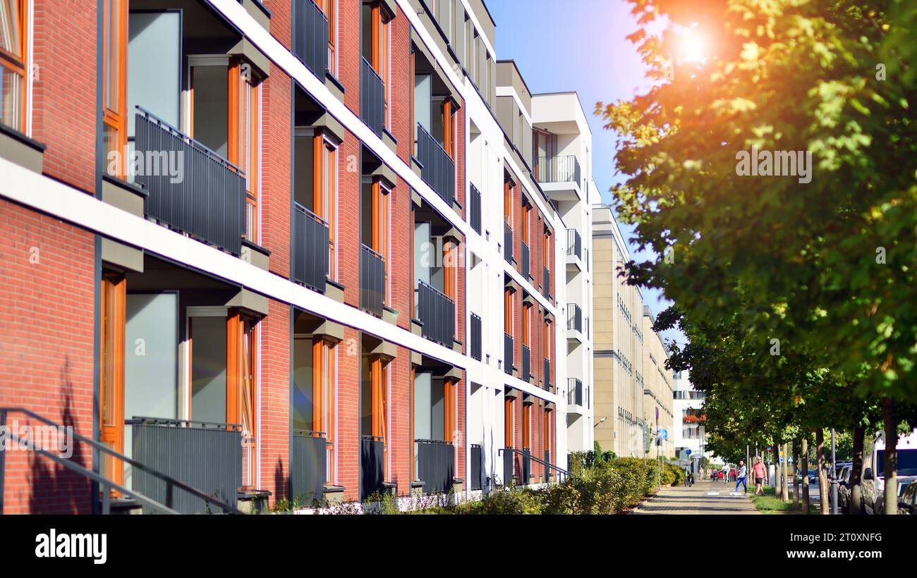 Green community. Eco apartment building saving energy and fresh air ...