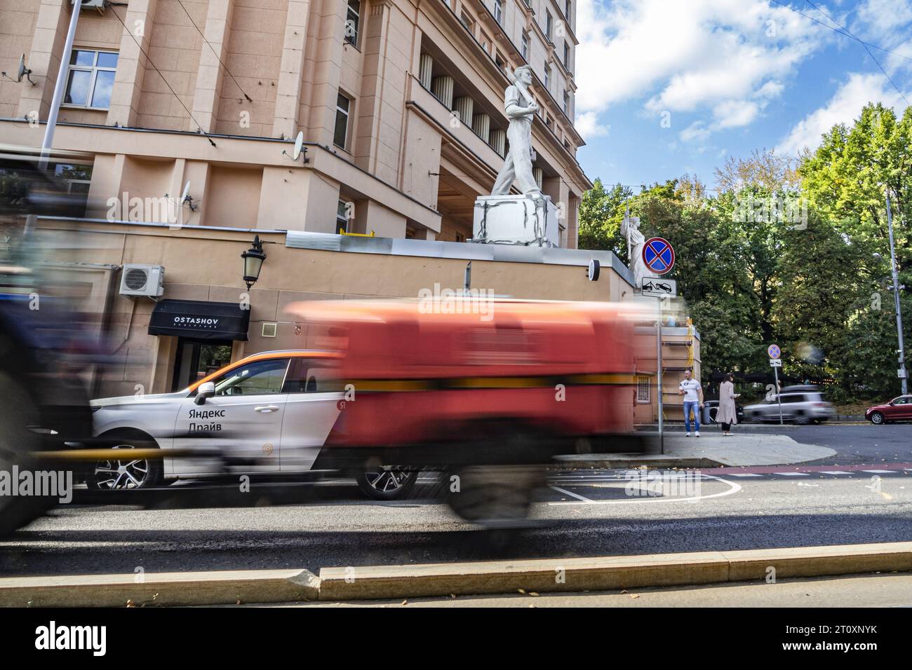 Russia, Moscow. Cars are driving along one of the streets of the city ...