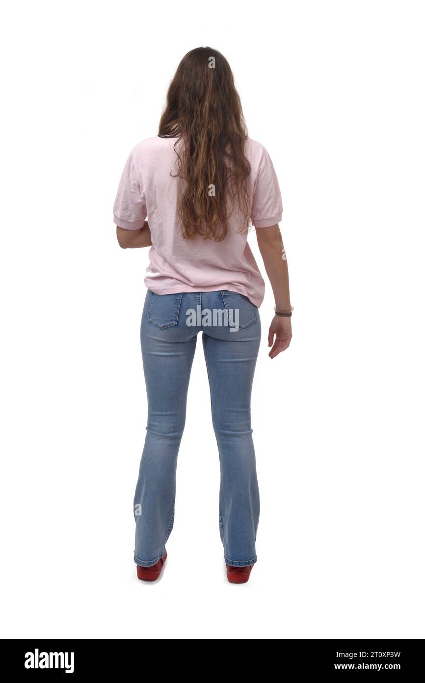 back view of a young girl standing with on white background Stock Photo ...
