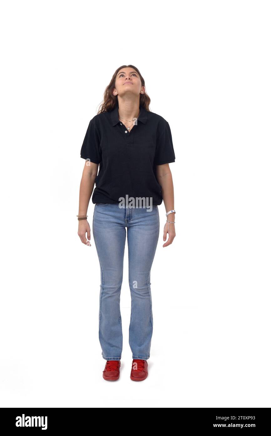 front view of young girl looking up on white background Stock Photo - Alamy