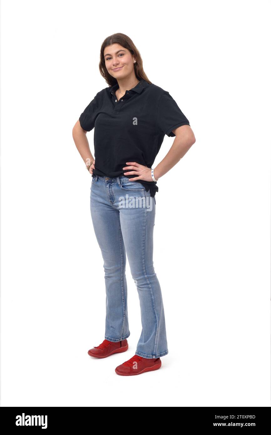 view of a young girl with arms akimbo on white background Stock Photo ...