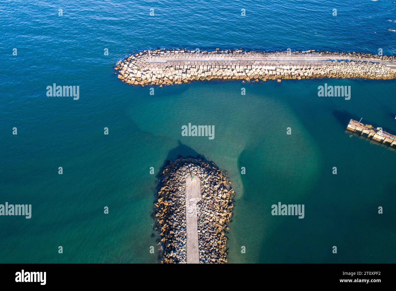 Aerial view with drone of a harbor breakwater Stock Photo - Alamy
