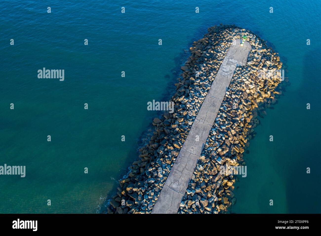 Aerial view with drone of a harbor seawall Stock Photo - Alamy