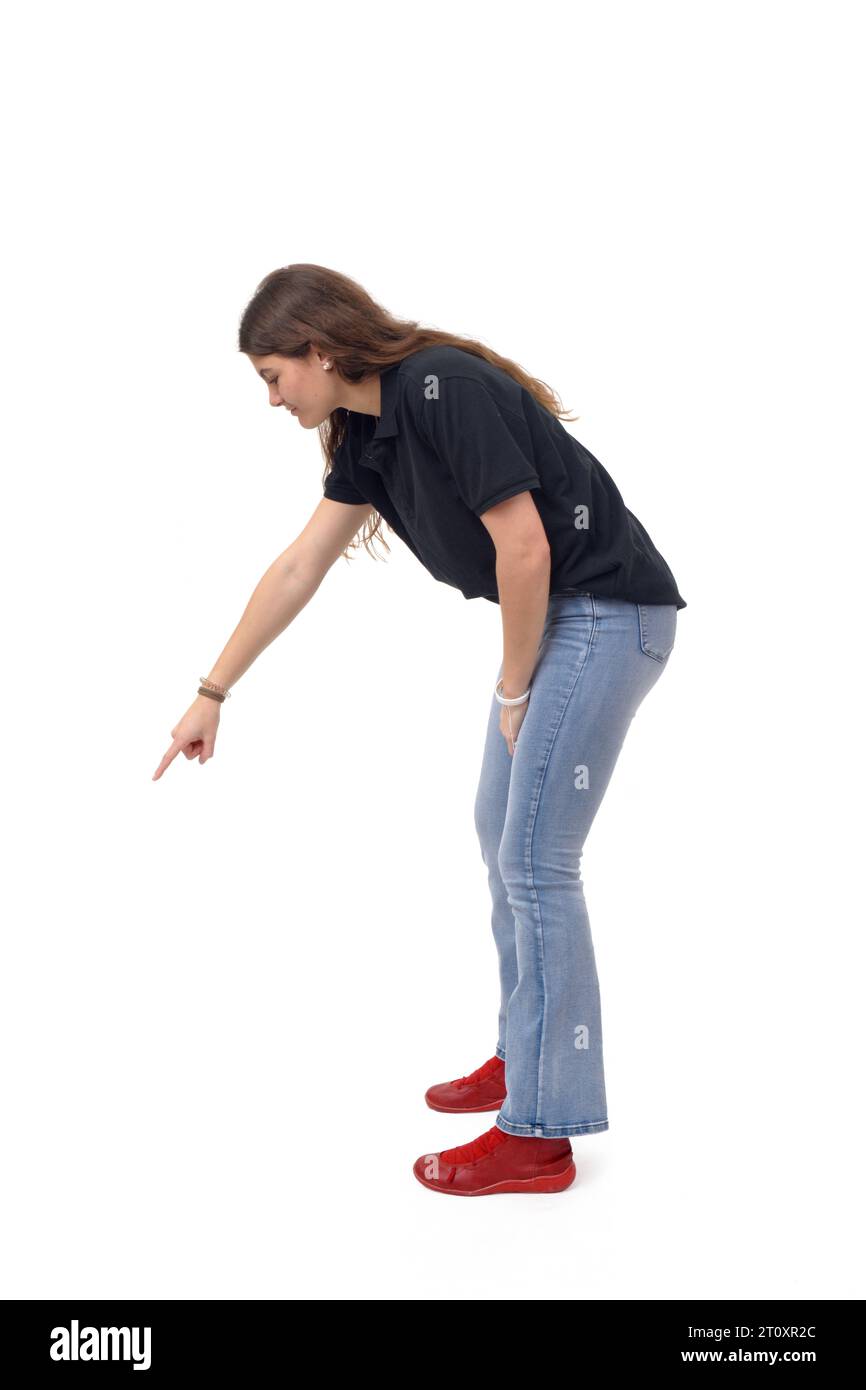 side view of a young girl to the ground on white background Stock Photo ...