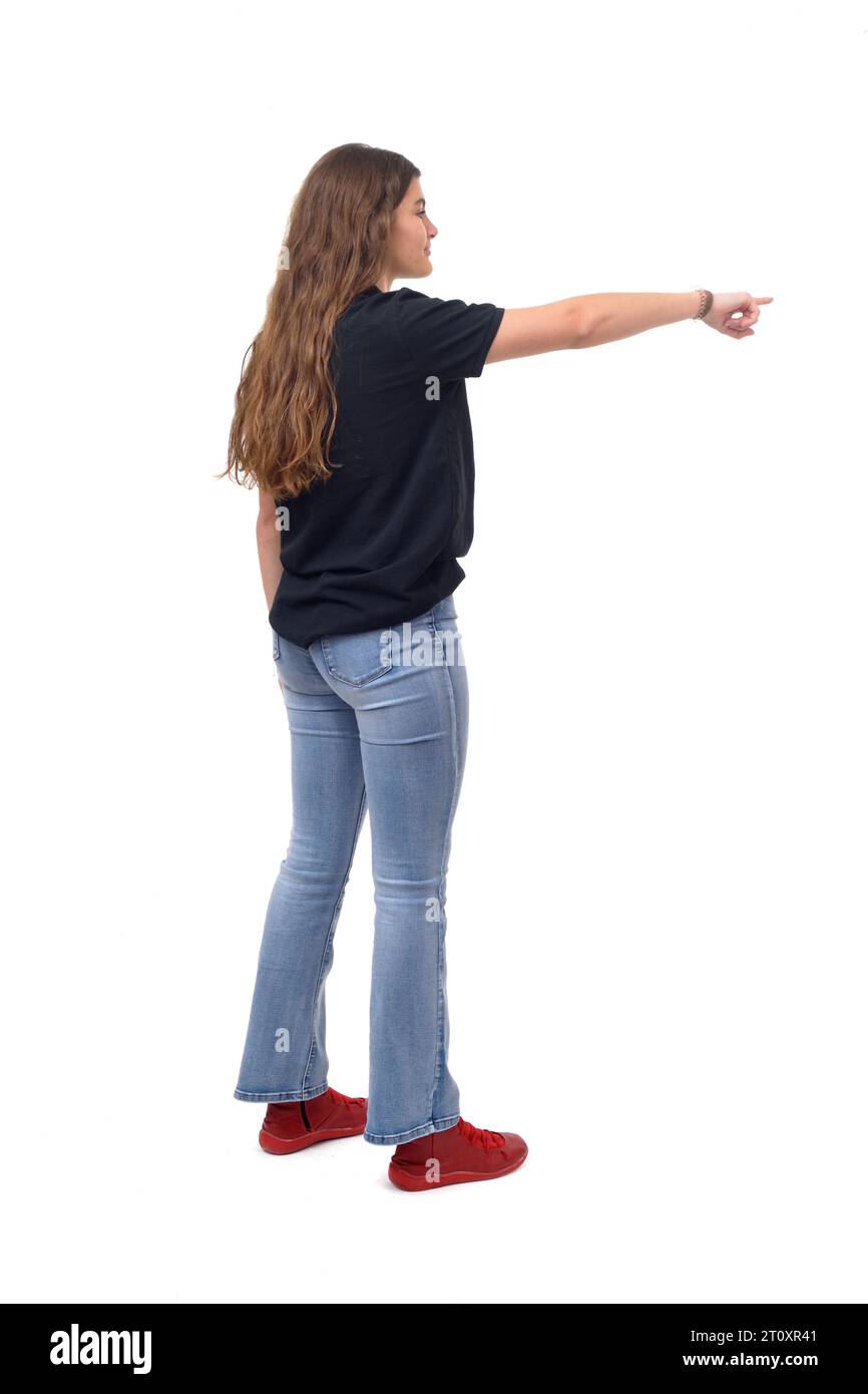 side view of a young girl pointing on white background Stock Photo - Alamy