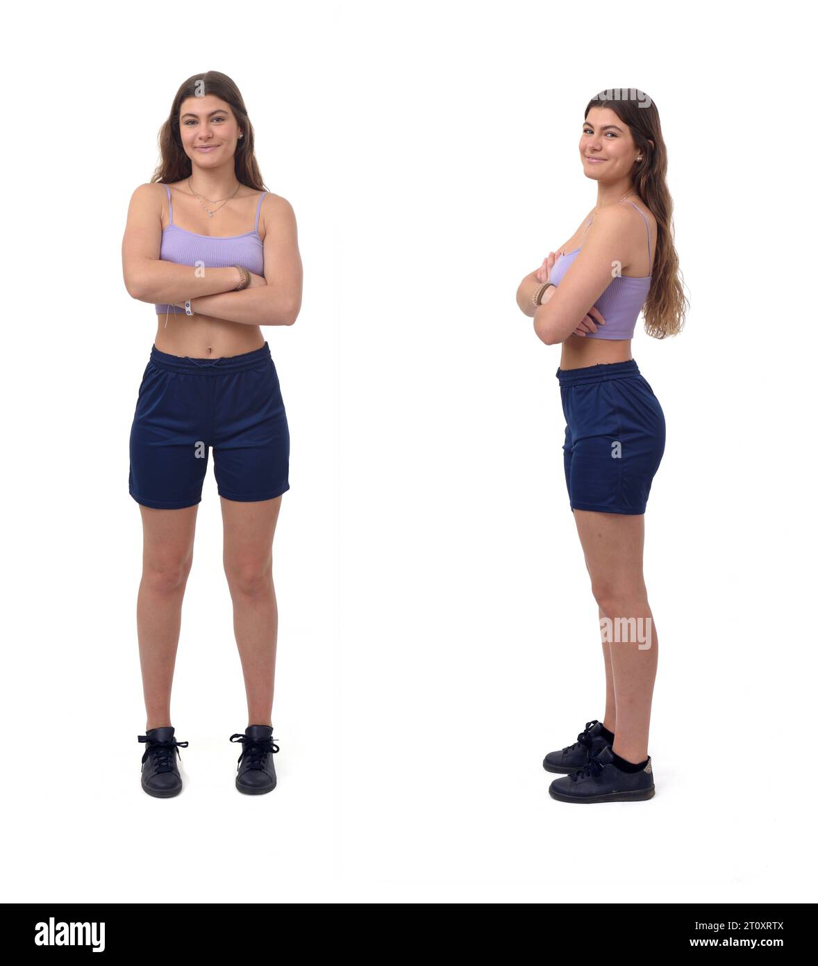 front and side view of a young girl standing with arms crossed on white ...