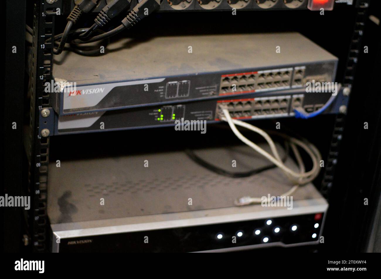 Cairo, Egypt, October 3 2023: HikVision NVR device and network switch ...