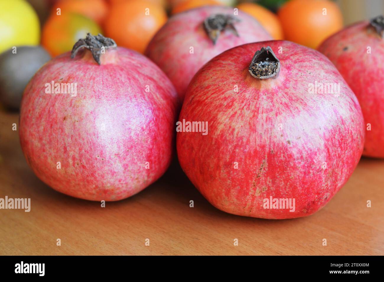 Close up whole pomegranate hi-res stock photography and images - Alamy