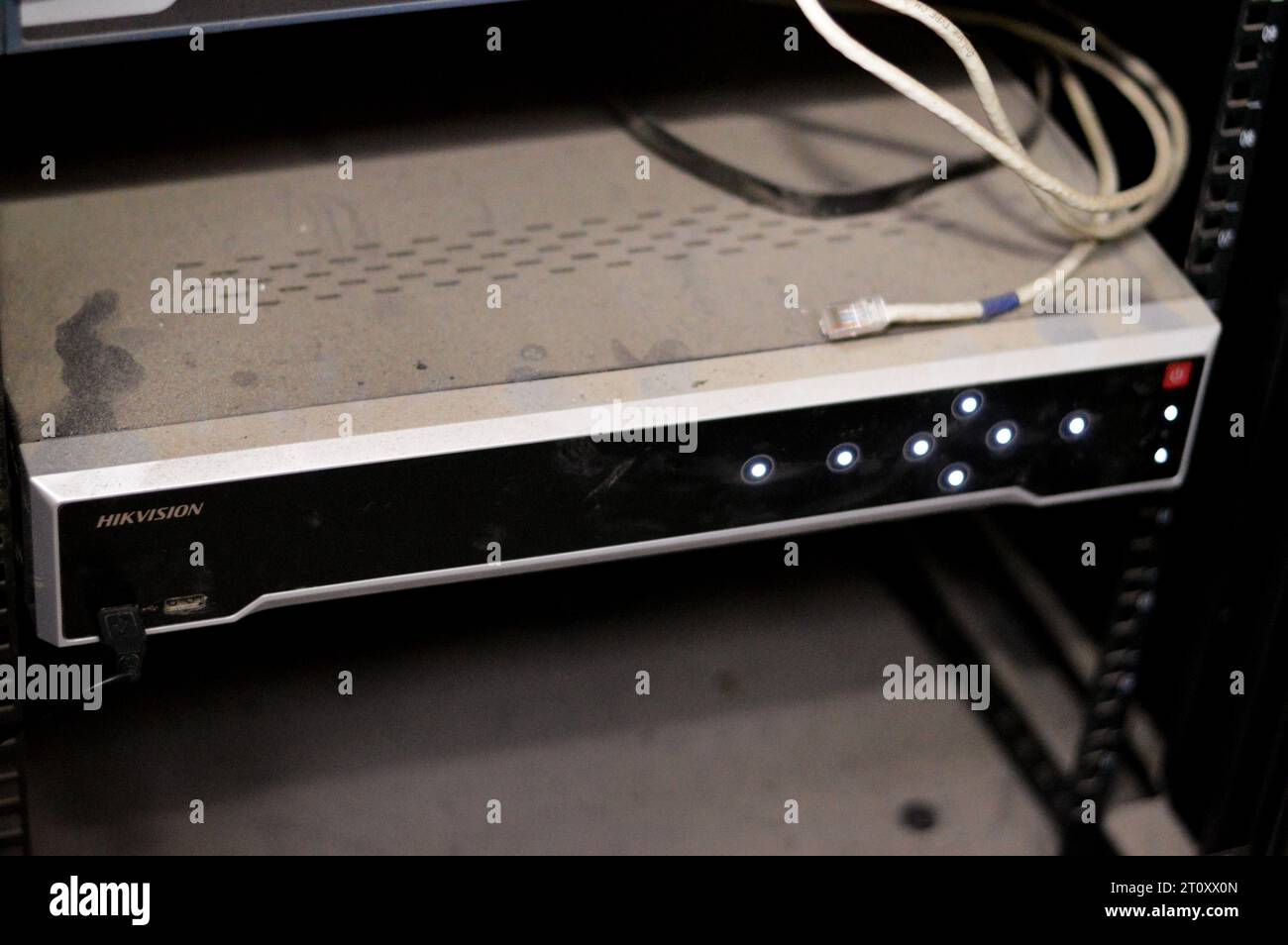 Cairo, Egypt, October 3 2023: HikVision NVR device and network switch ...