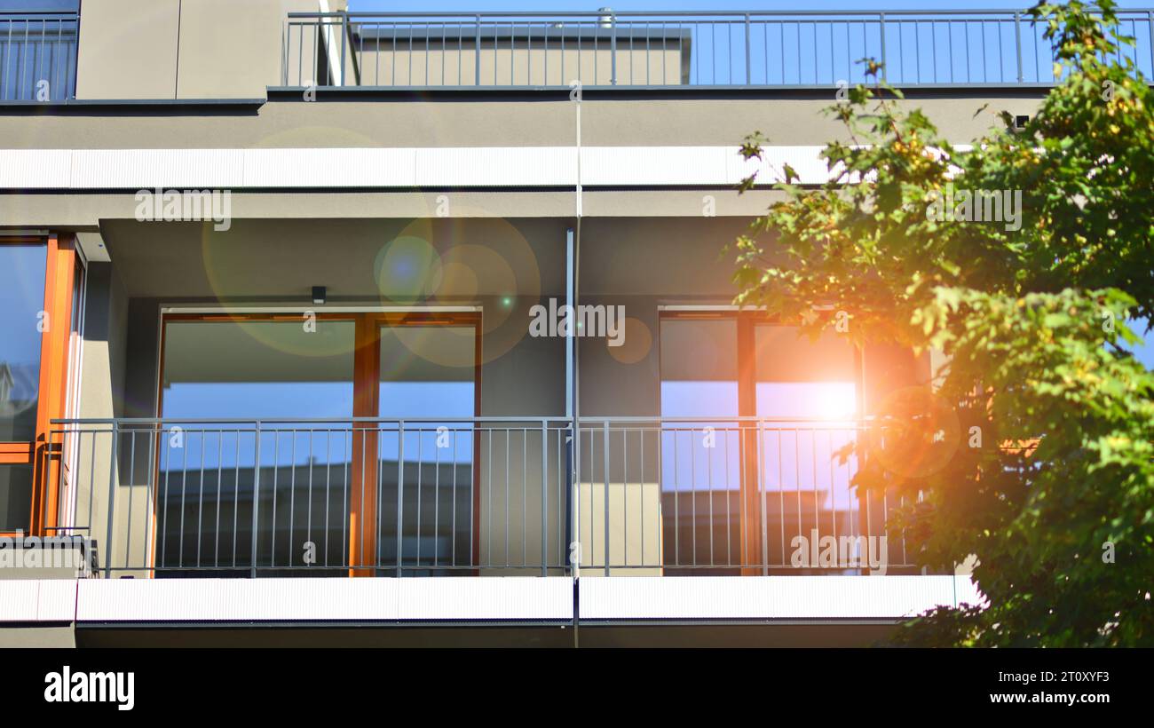 Green community. Eco apartment building saving energy and fresh air ...