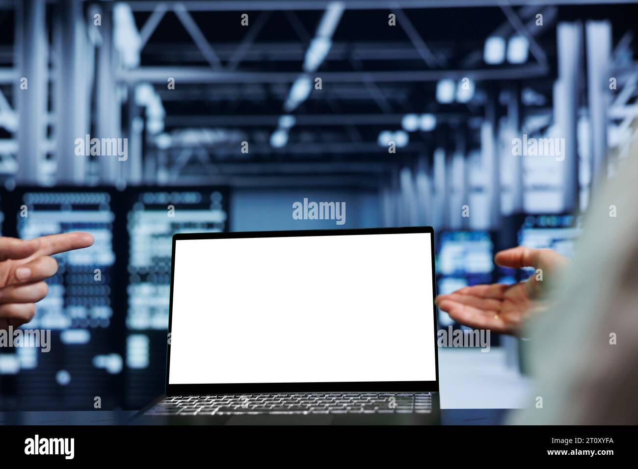 Close up shot of mock up laptop used by competent technician in data ...