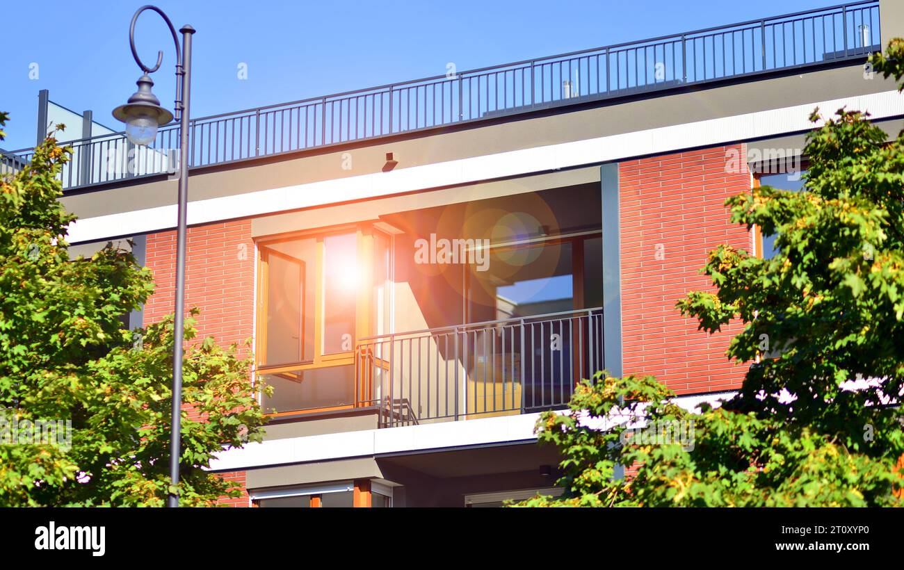 Green community. Eco apartment building saving energy and fresh air ...