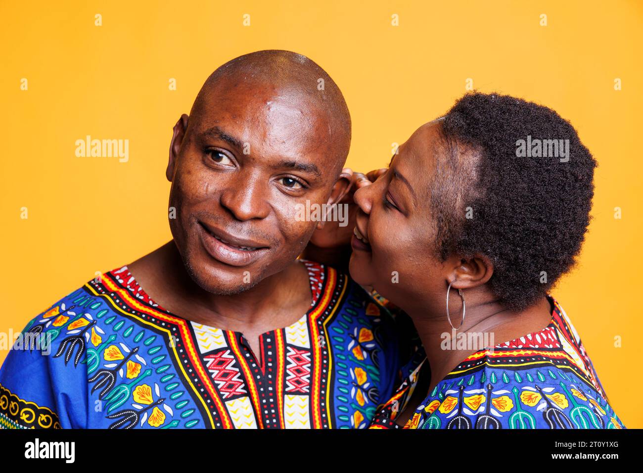 African american man and woman couple sharing secret, expressing love ...