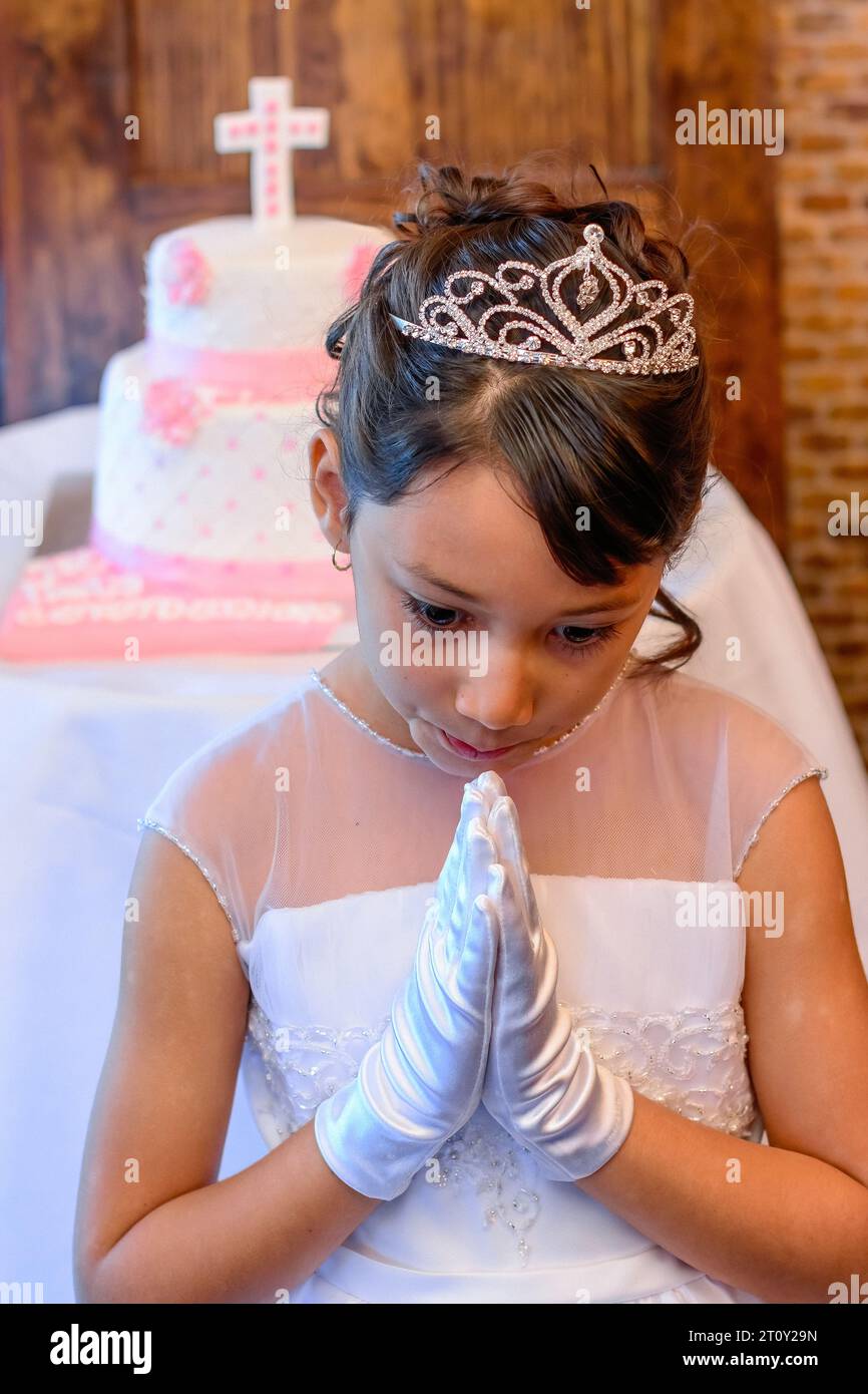 First Communion Girl Praying, Toronto, Canada Stock Photo - Alamy