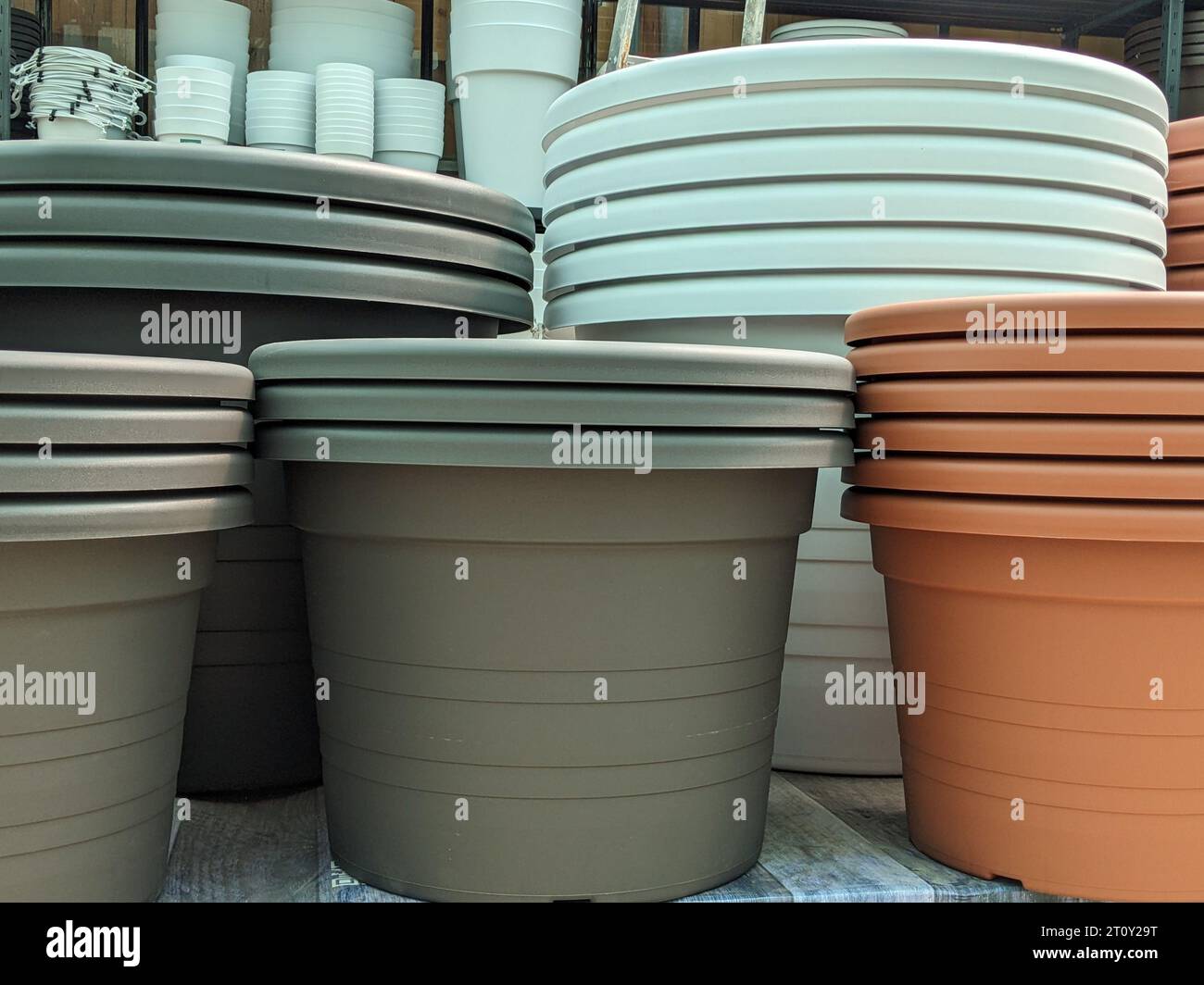 Recycled plastic pots displayed for sale. Concept of recycled products ...