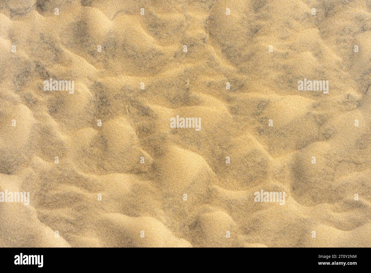 Gold sand on the beach, background series Stock Photo - Alamy