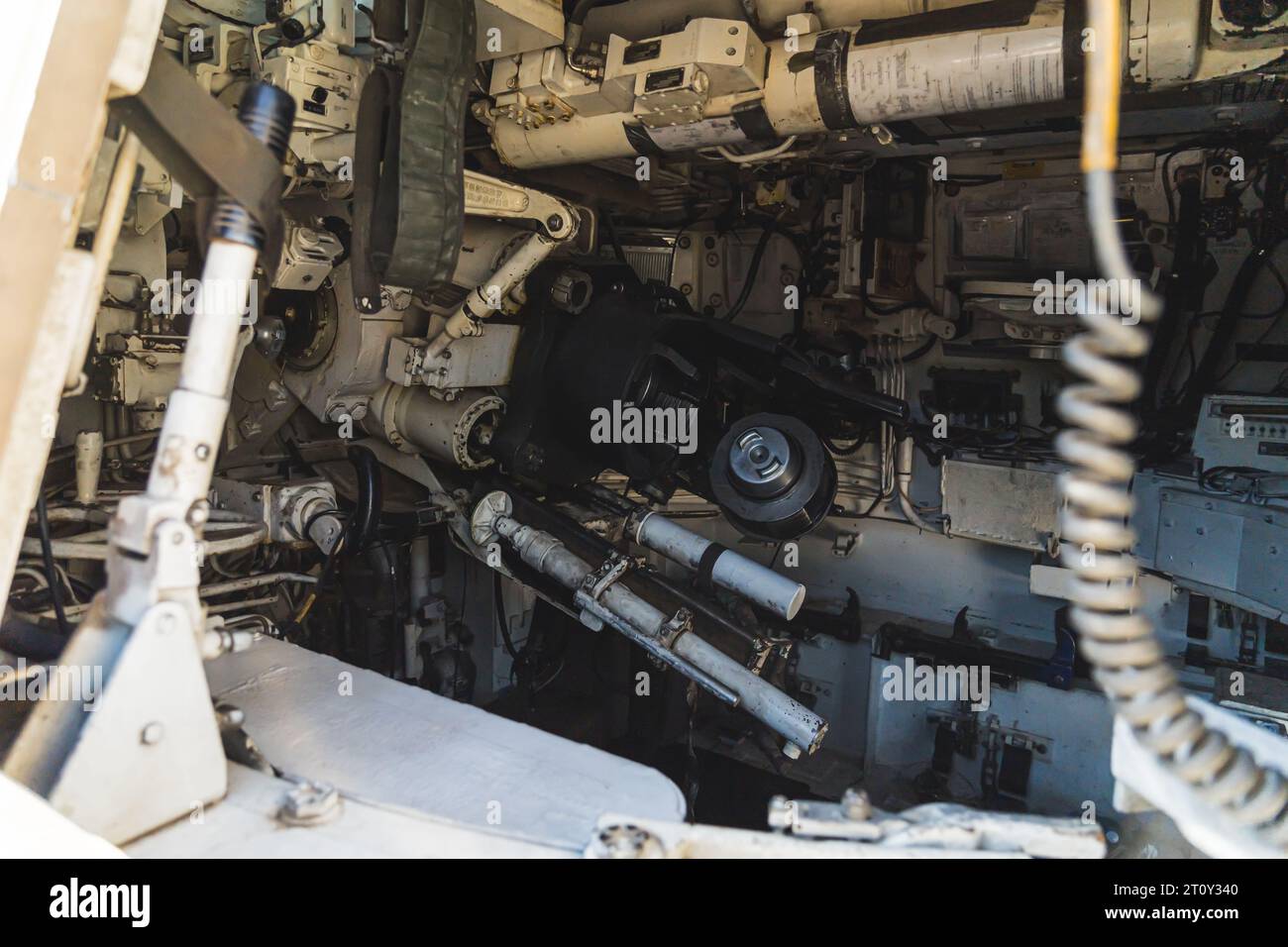 Inside view of a seat of soldier loading missiles. Monitors and ...