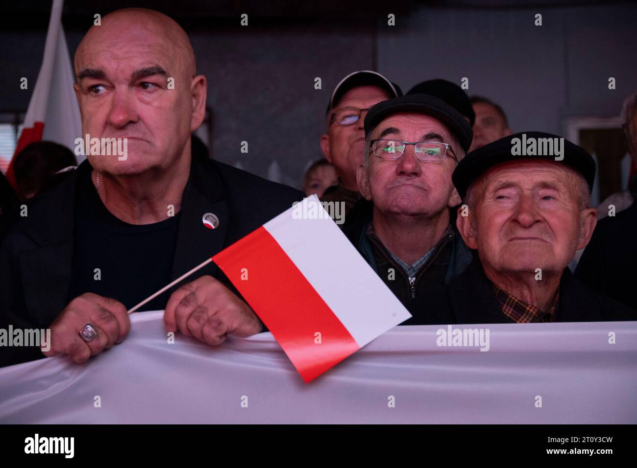 Supporters of the ruling Law and Justice party watch the elections ...