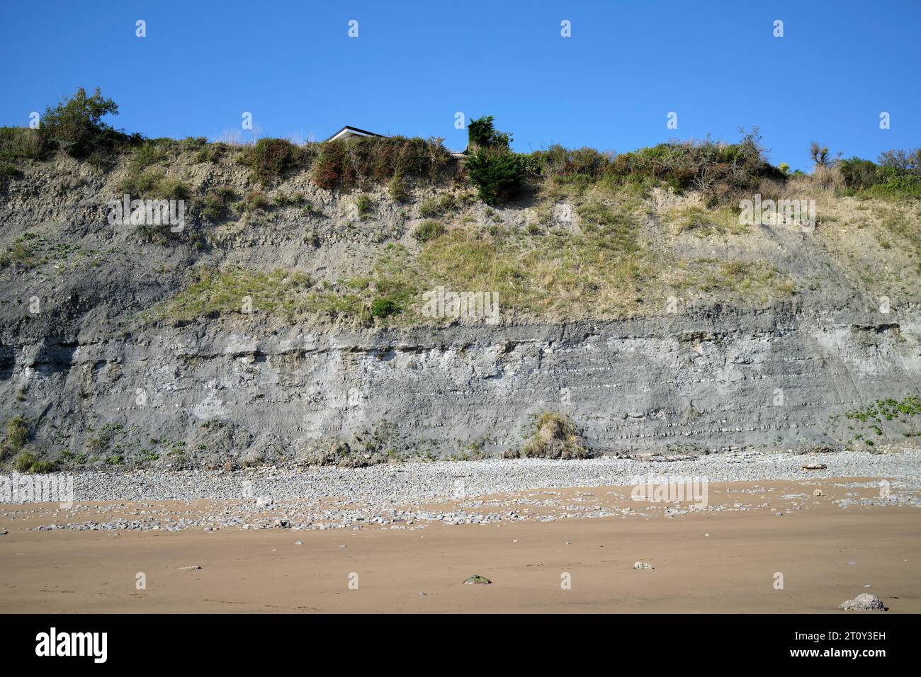 Cliff Face in St Marys Well Bay with Caravan Park Chalet just in view ...