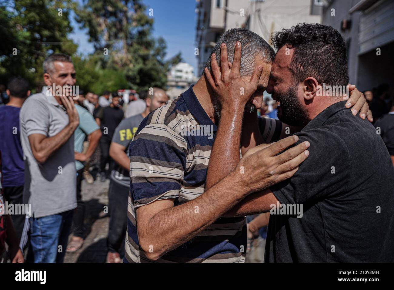 Gaza, Gaza, Palestine. 7th Oct, 2023. The brother of the martyr hugs ...