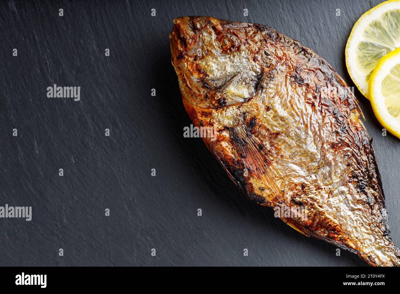Whole baked dorado fish hi-res stock photography and images - Alamy