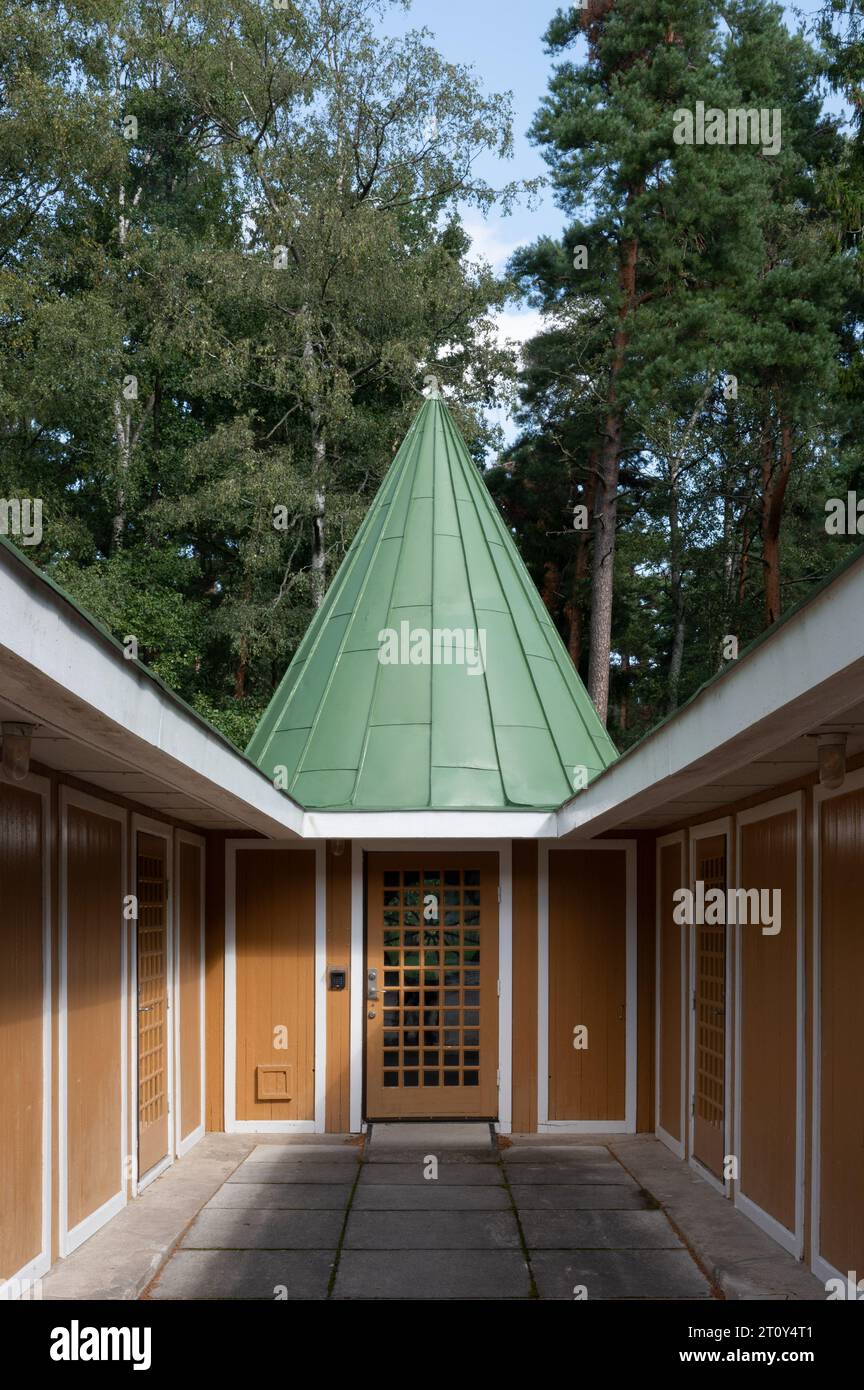A stunning view of the Woodland Cemetery Visitor Center, a UNESCO World ...