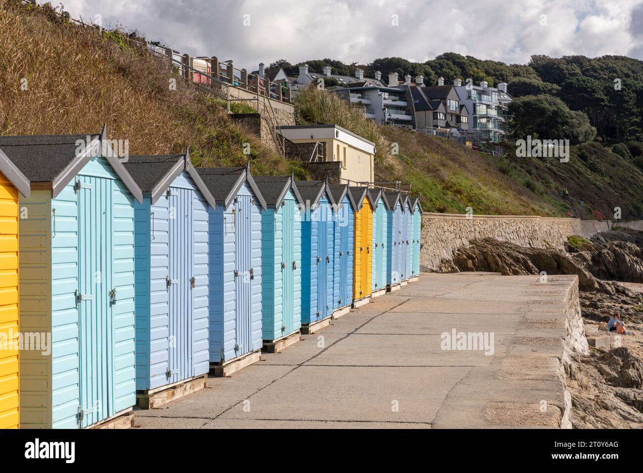 Falmouth Cornwall, blue and yellow painted beach huts at Castle Beach ...