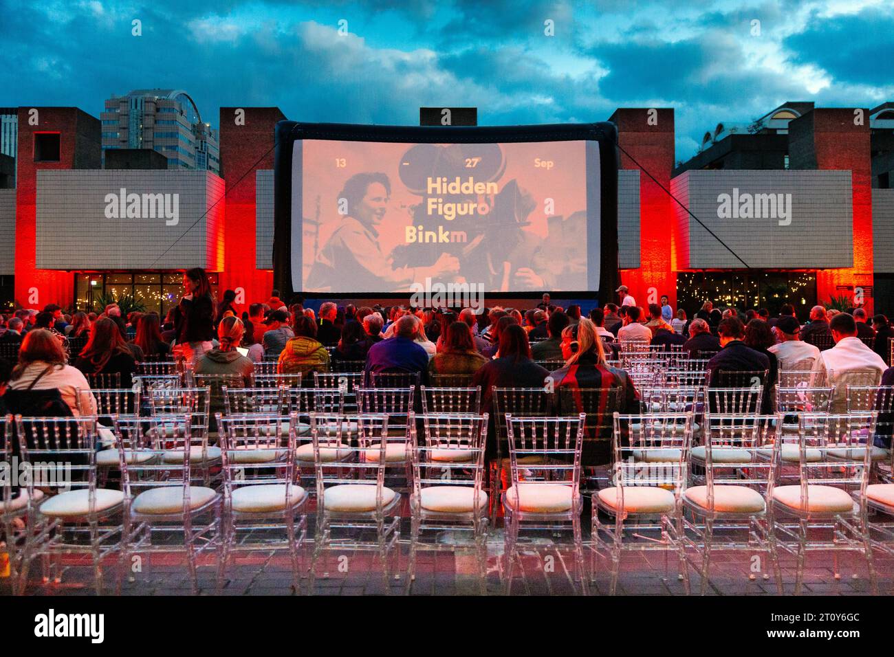 Outdoor cinema film screening at the Sculpture Court of Barbican Centre, London, England Stock ...