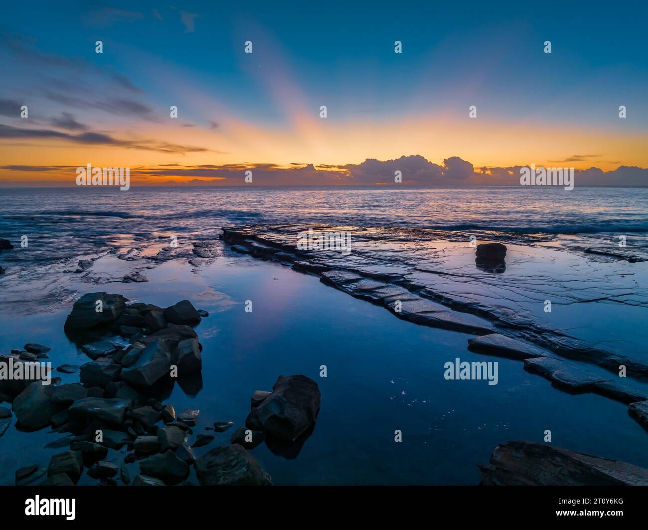 Aerial sunrise seascape from the rocky inlet known as The Skillion in ...