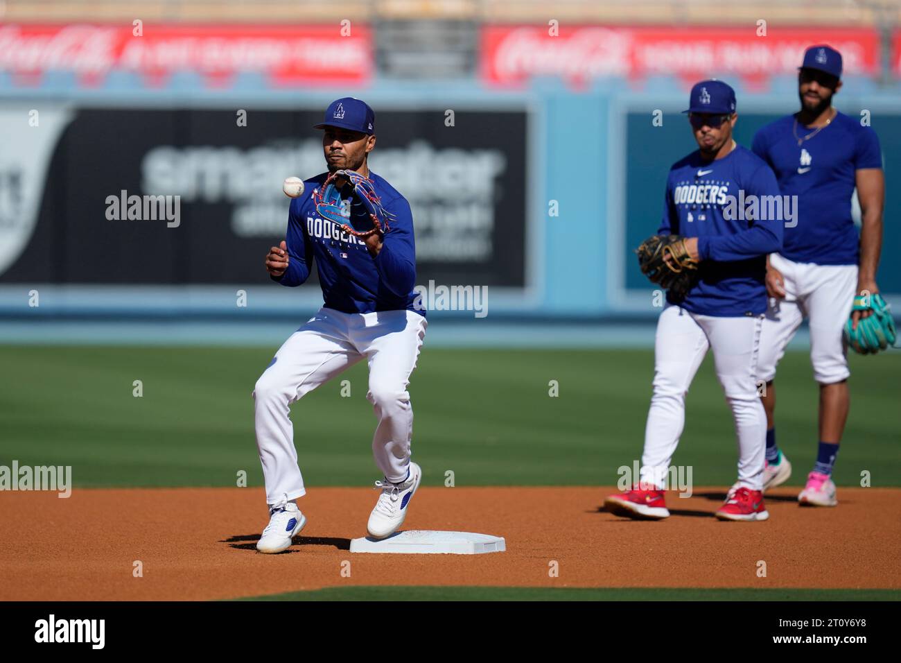 Los Angeles Dodgers' Mookie Betts takes fielding practice before Game 2 of a baseball NL ...