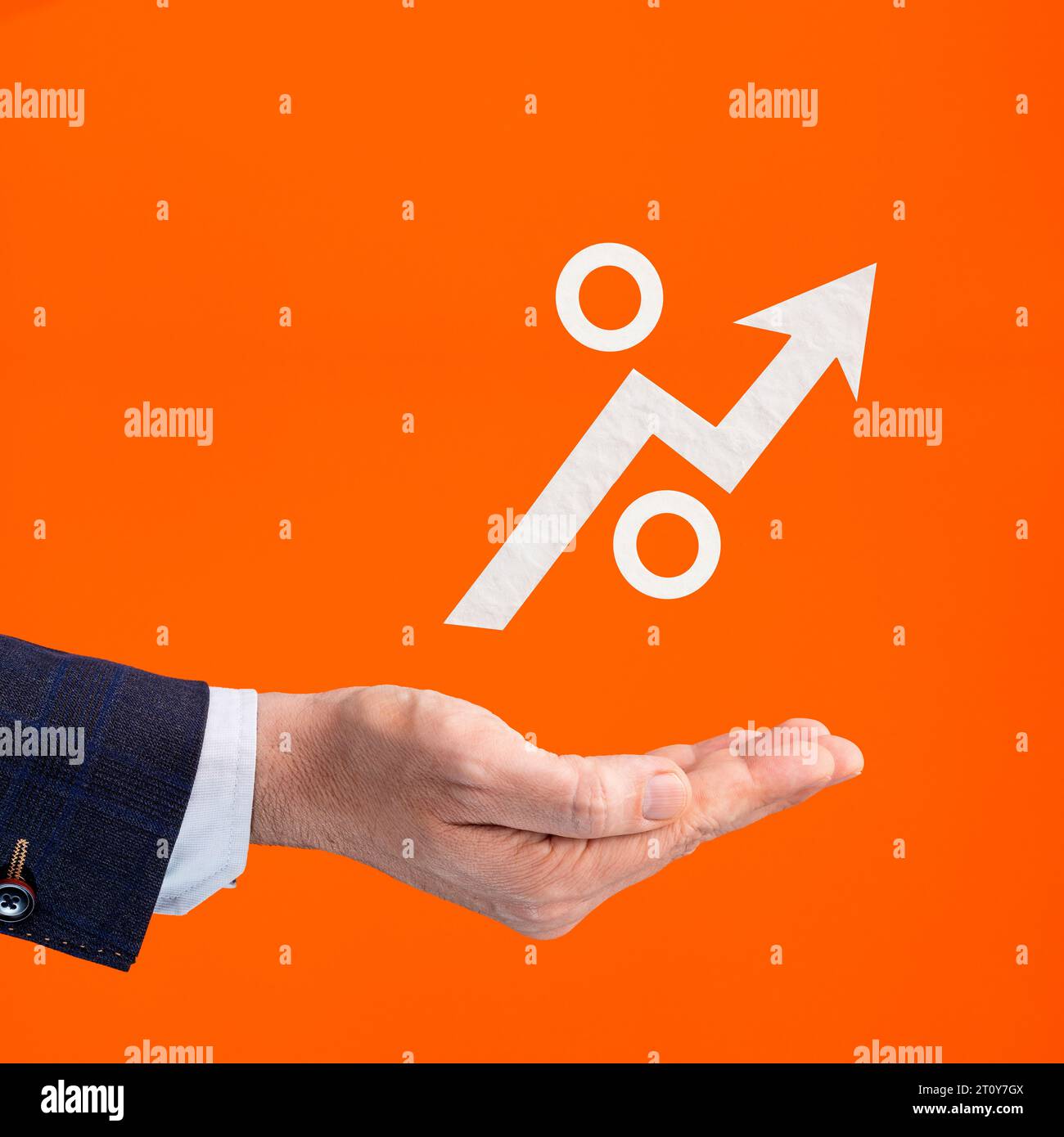 Hand holding rising percentage icon, representing business growth Stock ...