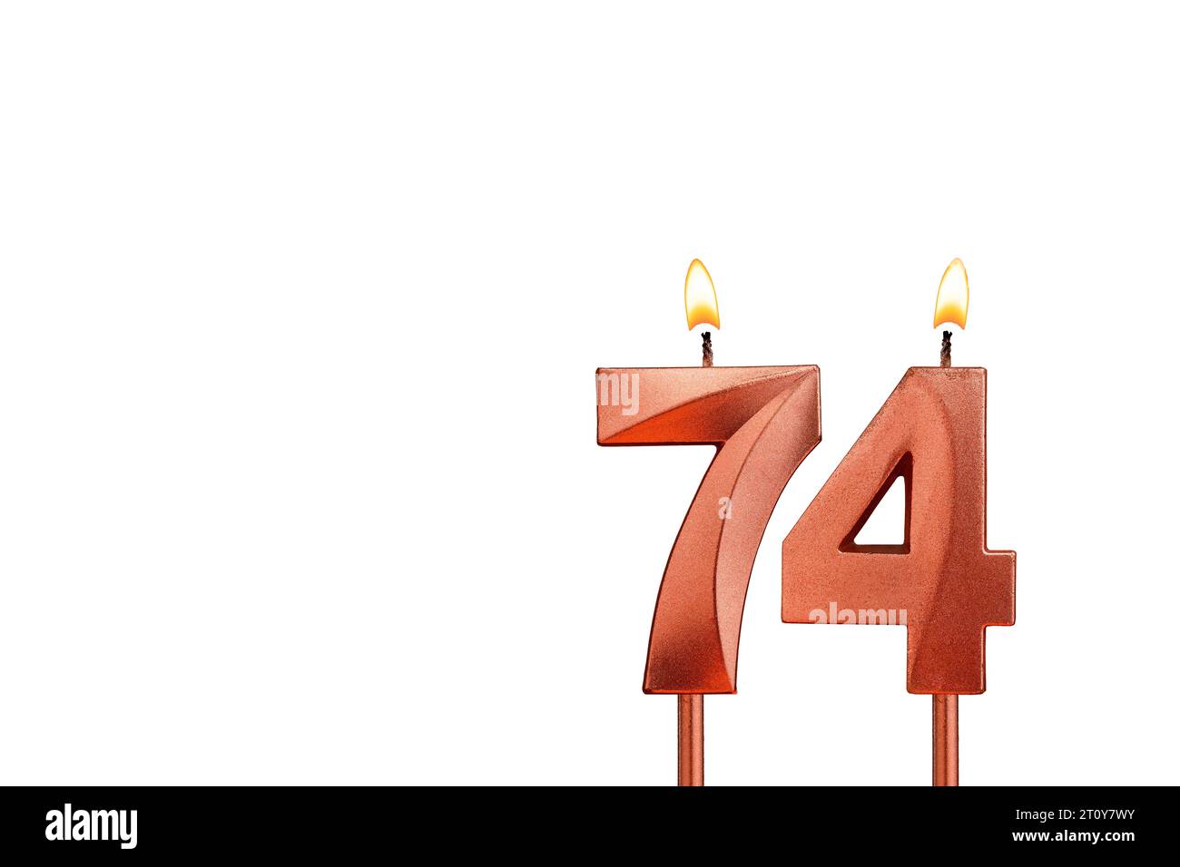 Burning candle number 74 for birthday on white background Stock Photo ...