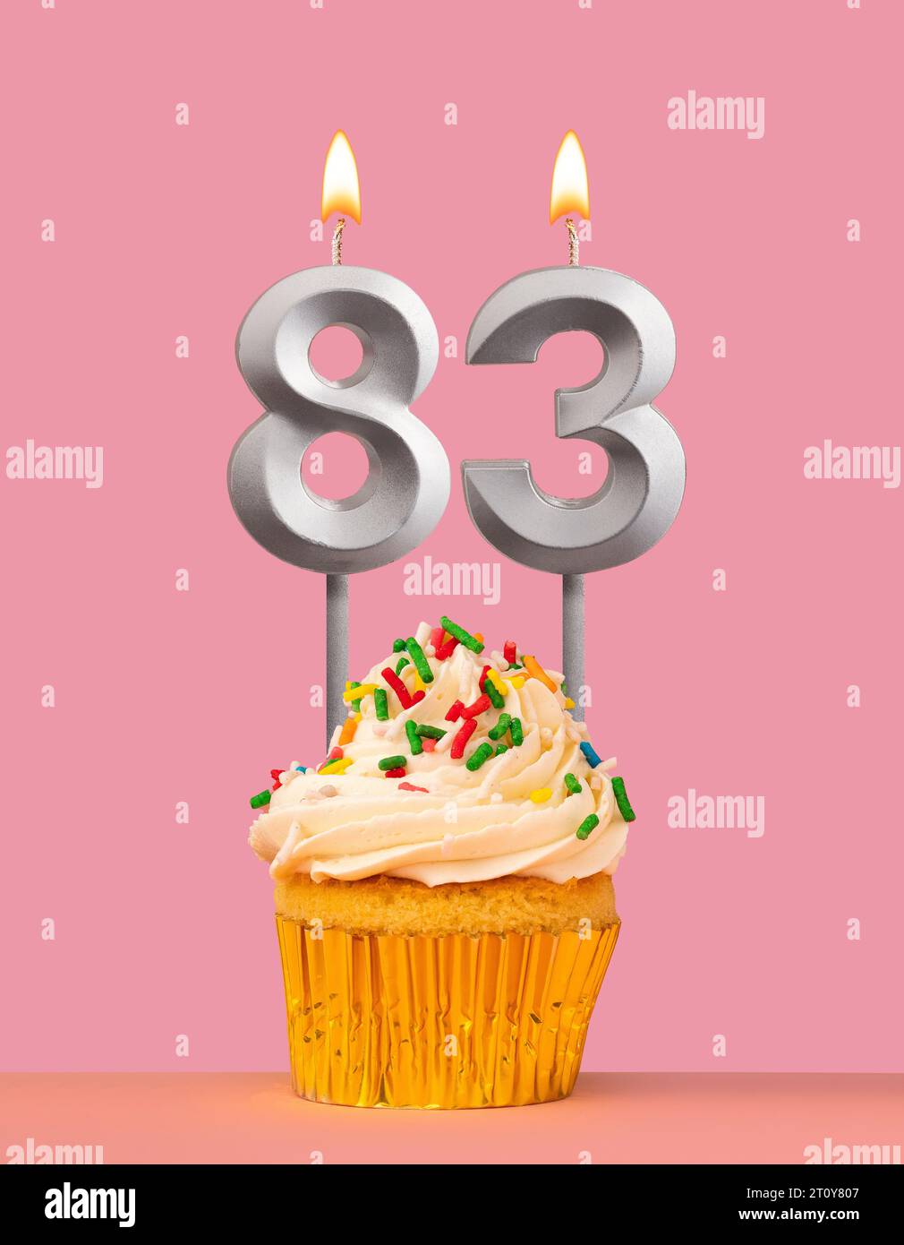 Birthday card with cupcake and candle number 83 Stock Photo - Alamy