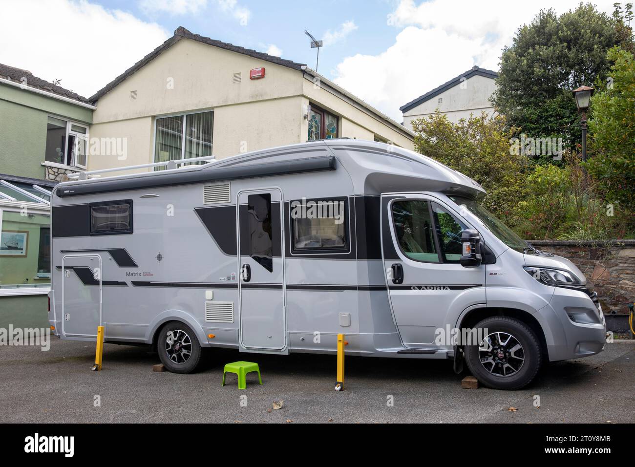 Adria Supreme 670DC silver motorhome parked in a home in Falmouth ...